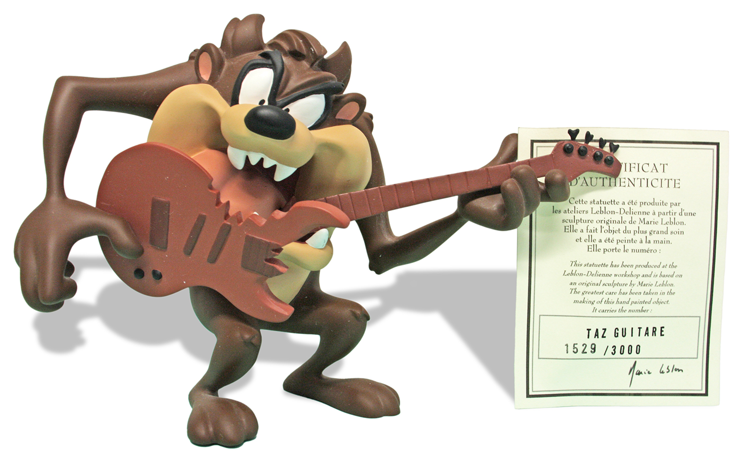 LOONEY TUNES - TAZ MANGE SA GUITARE